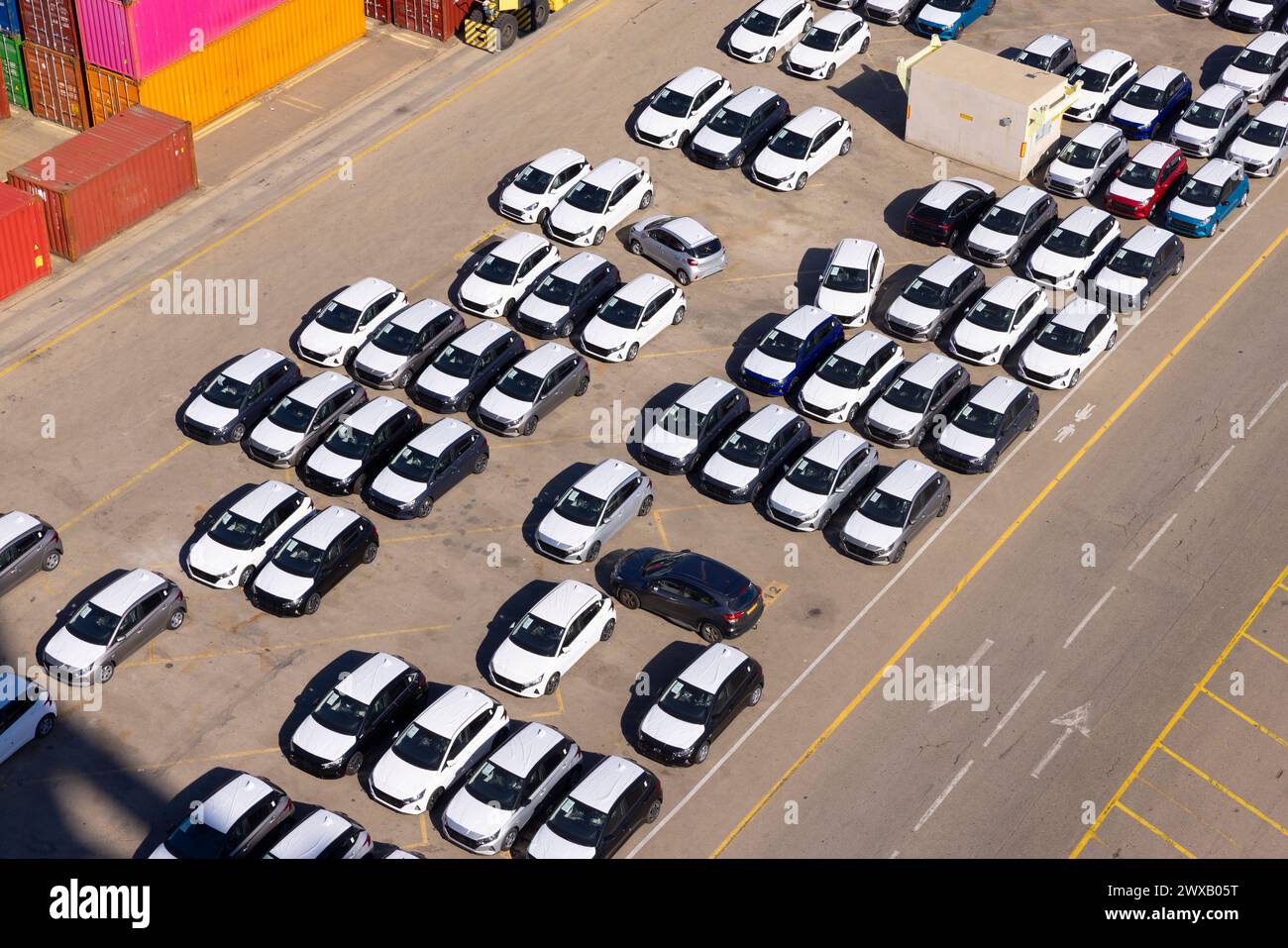 New imported cars and Shipping containers being unloaded at port ...