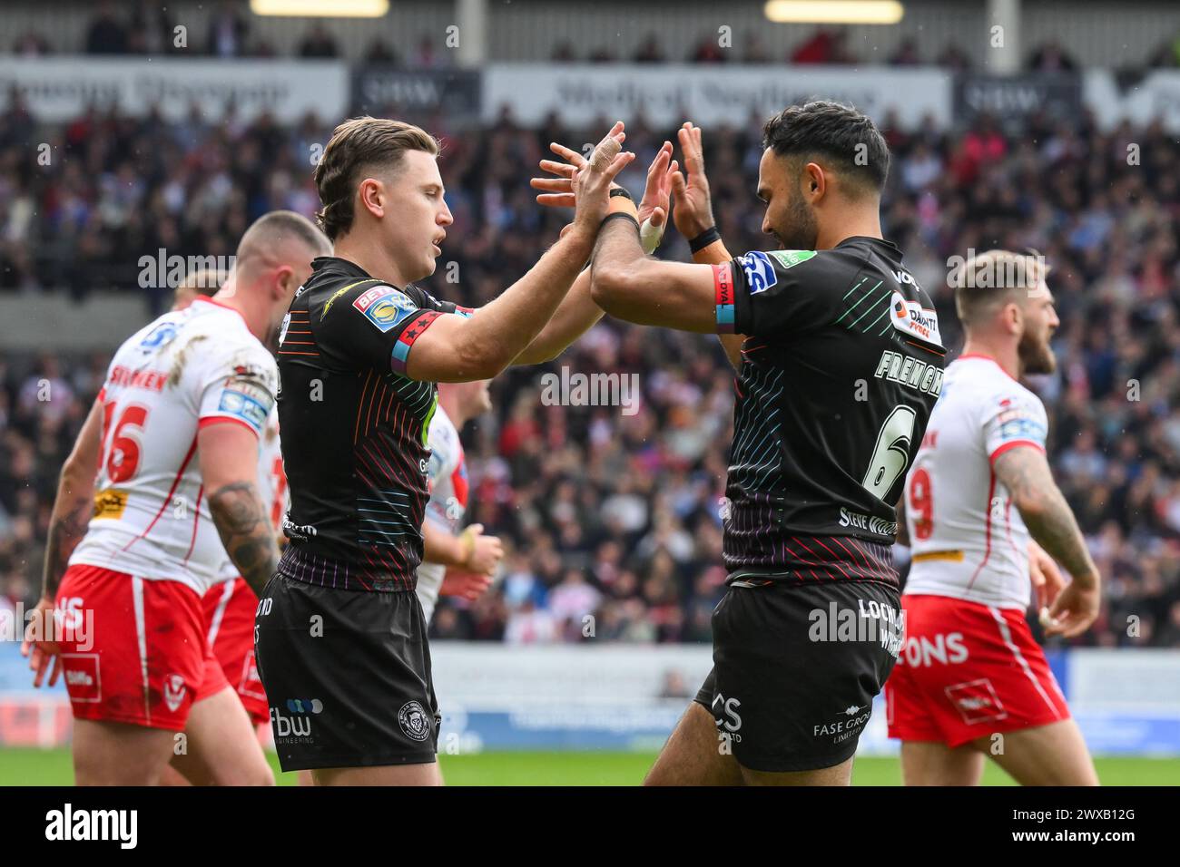 Jai Field of Wigan Warriors and Bevan French of Wigan Warriors ...