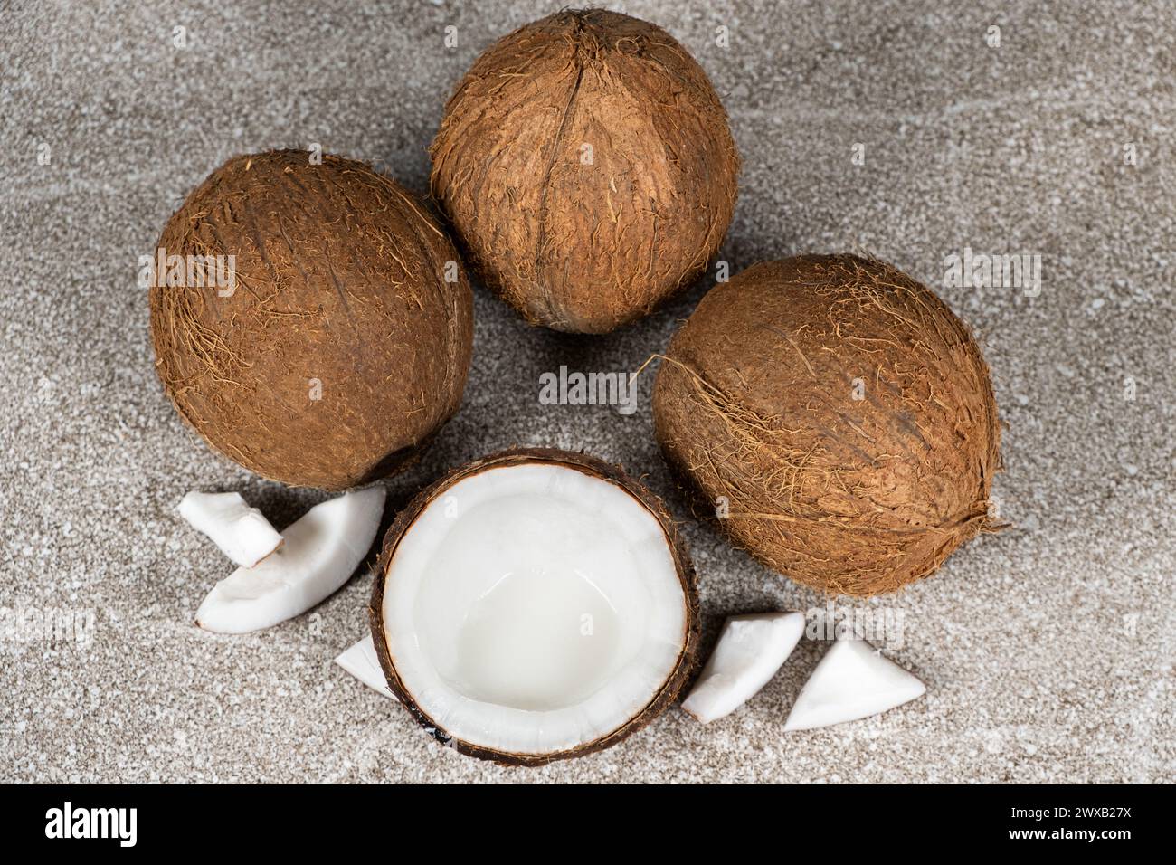 Coconut milk in half a coconut Stock Photo - Alamy