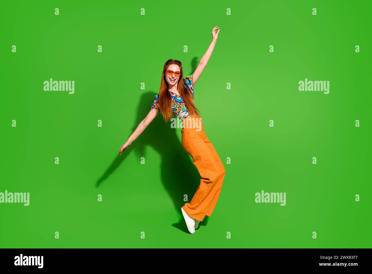 Full size photo of pretty young woman stand tiptoe dance empty space ...