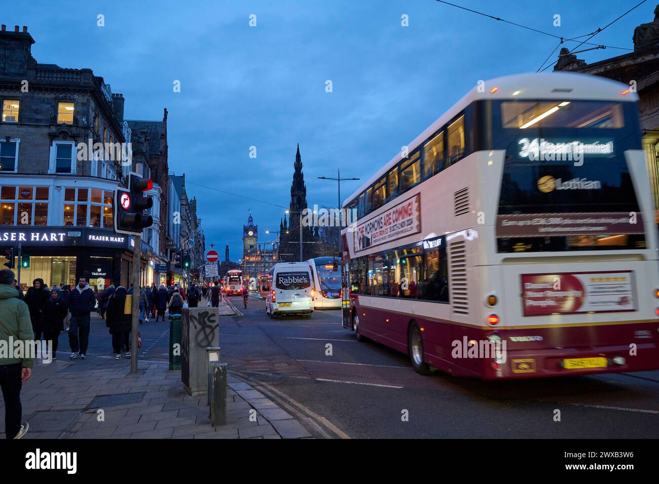 A dusk view of Buses on Princes Street, Edinburgh, capital city of ...