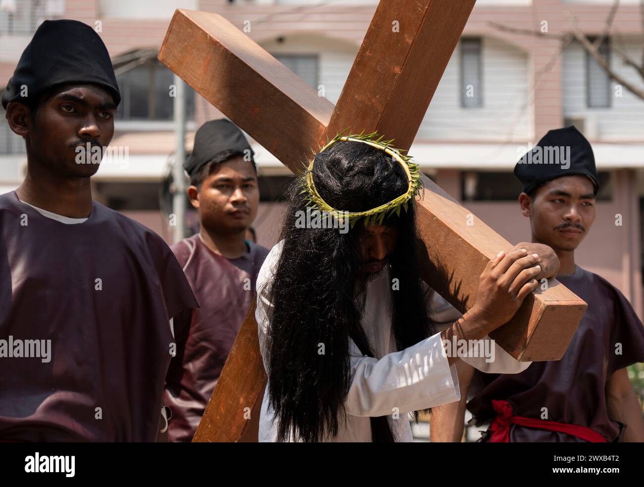 Christian devotees takes part in a perform to re-enactment of the ...