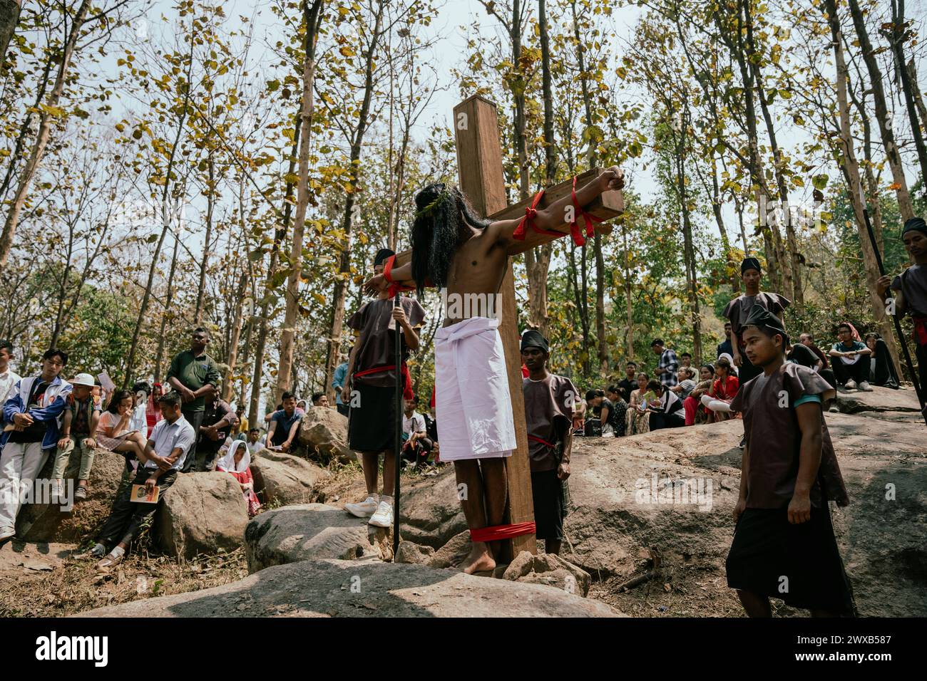 Christian devotees takes part in a perform to re-enactment of the ...