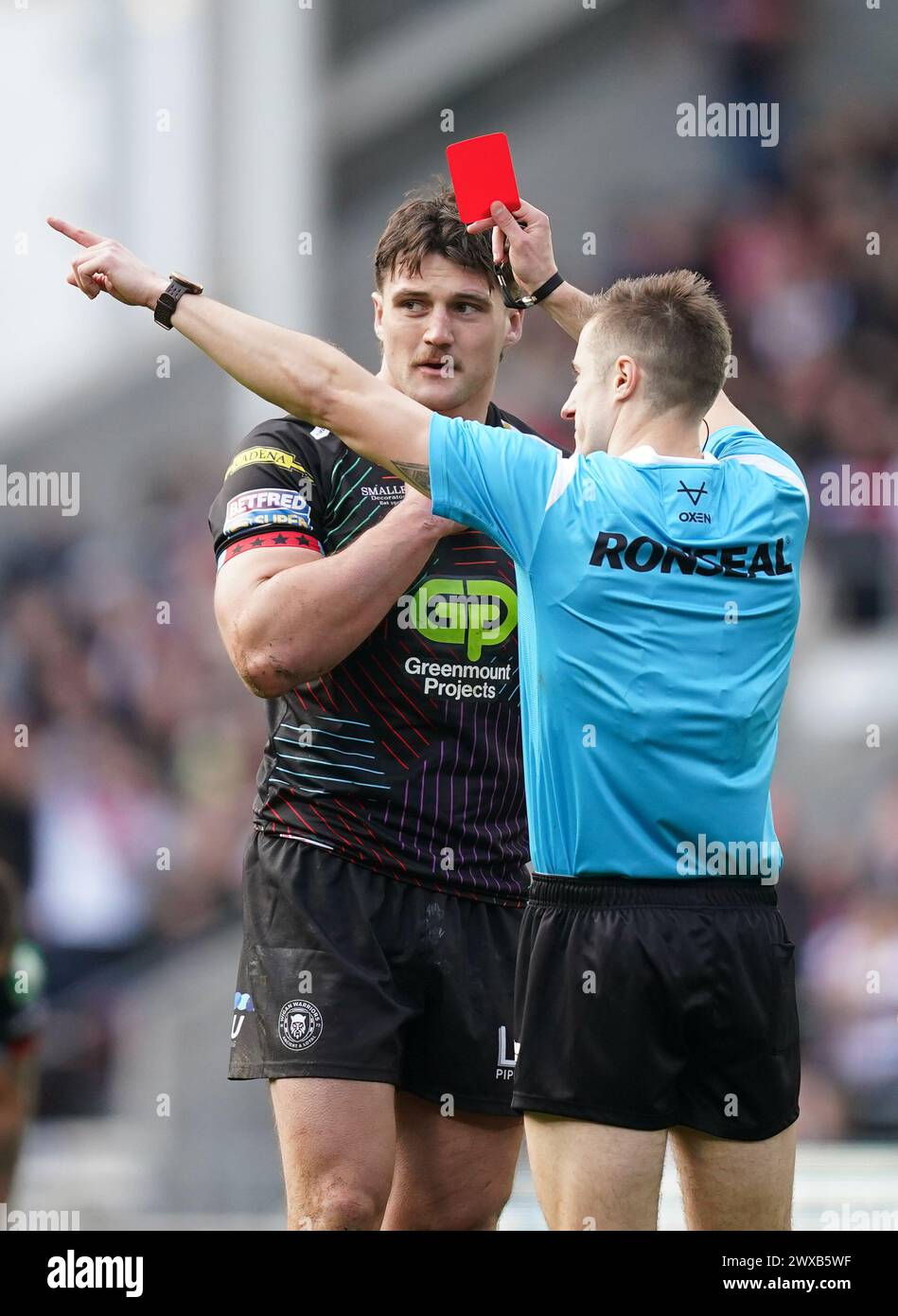 Wigan Warriors' Luke Thompson is shown a red card during the Betfred ...