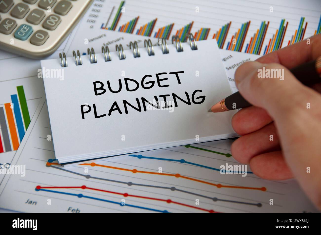 Budget planning text on notepad with business analysis background Stock ...