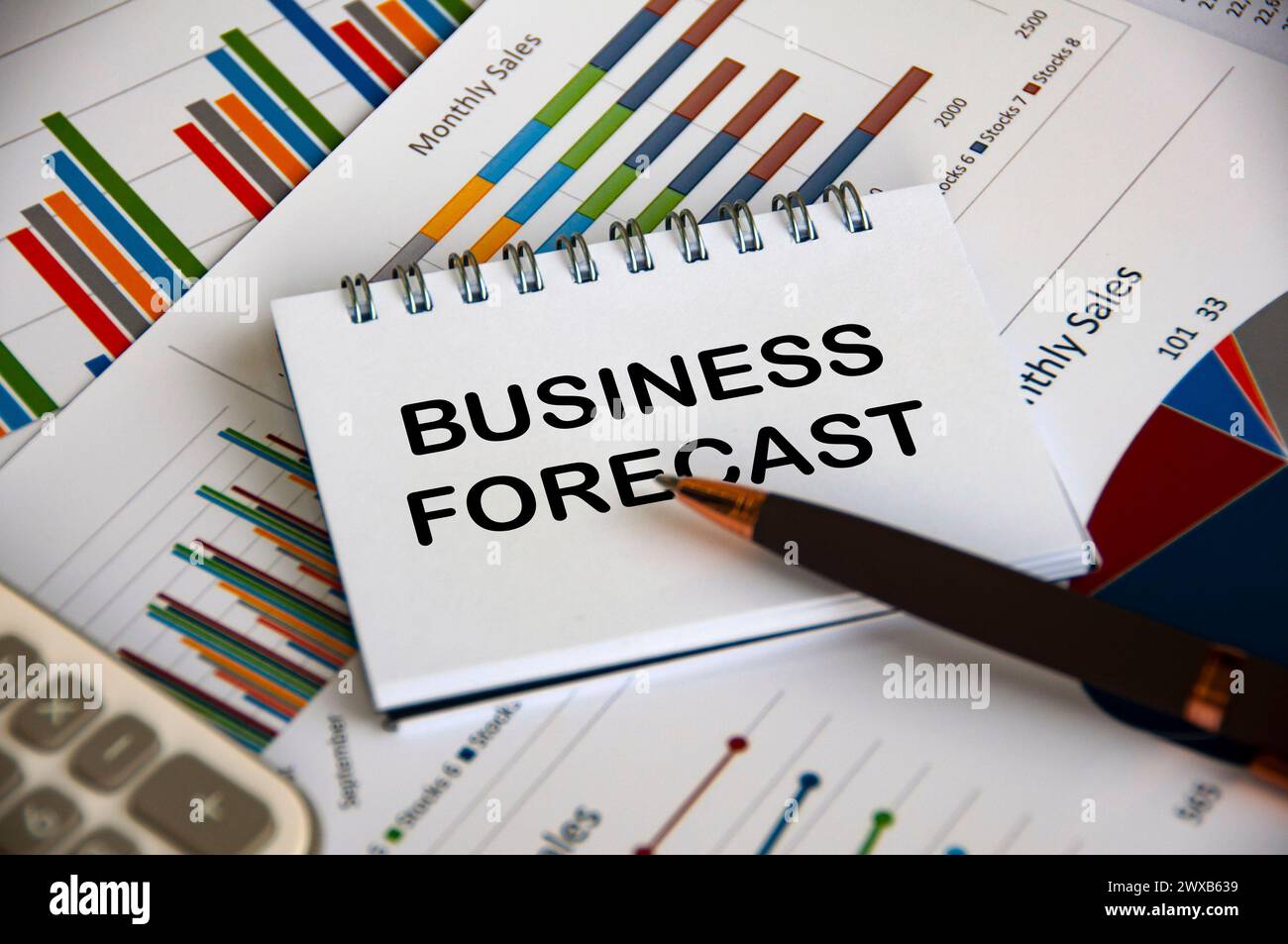 Business forecast text on notepad with business analysis background ...