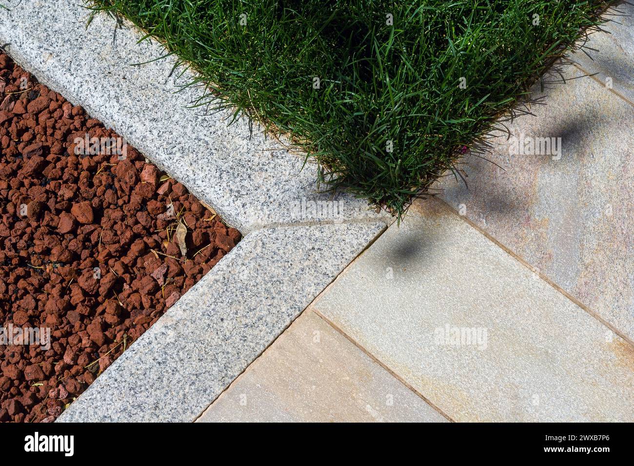 courtyard paving with sandstone plates and gray granite curbs Stock ...