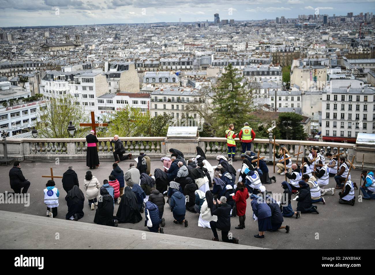 Nuns and worshippers attend a Stations of the Cross procession ...