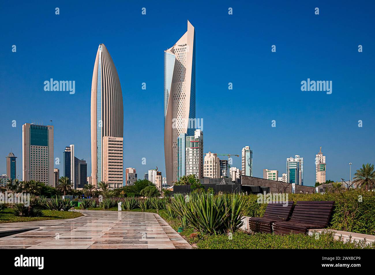 the fascinating Al Hamra Tower skyscraper in Kuwait City photographed from a beautiful urban ...