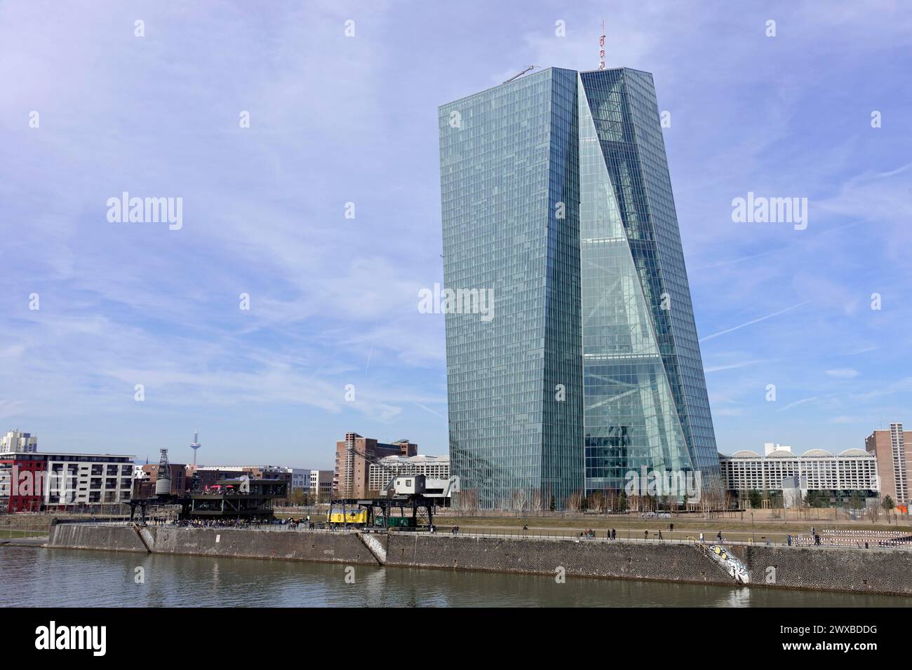 The new European Central Bank, ECB, Urban glass building on a riverbank ...