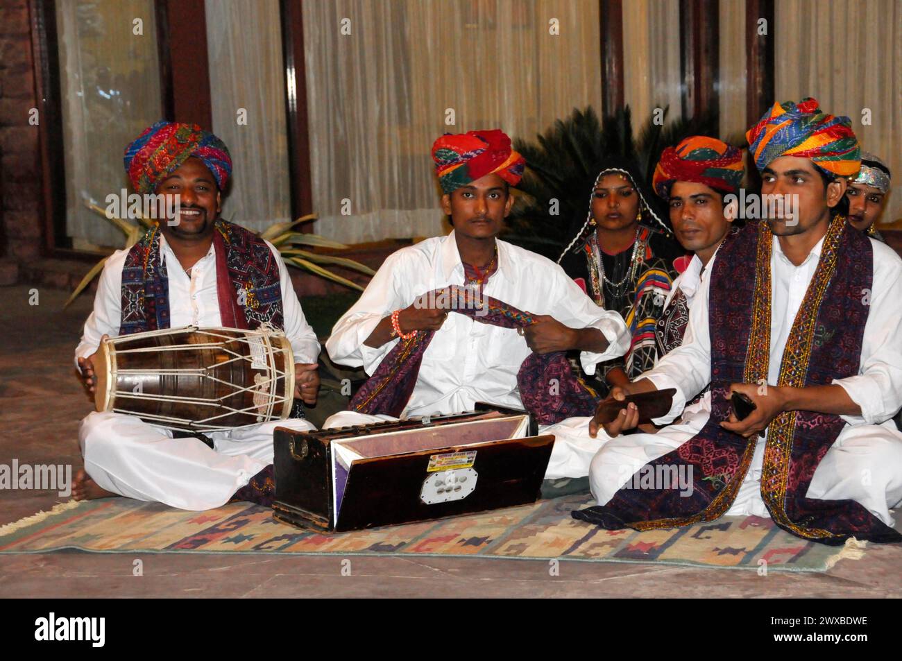 Group of traditionally dressed Rajasthani musicians at a performance ...