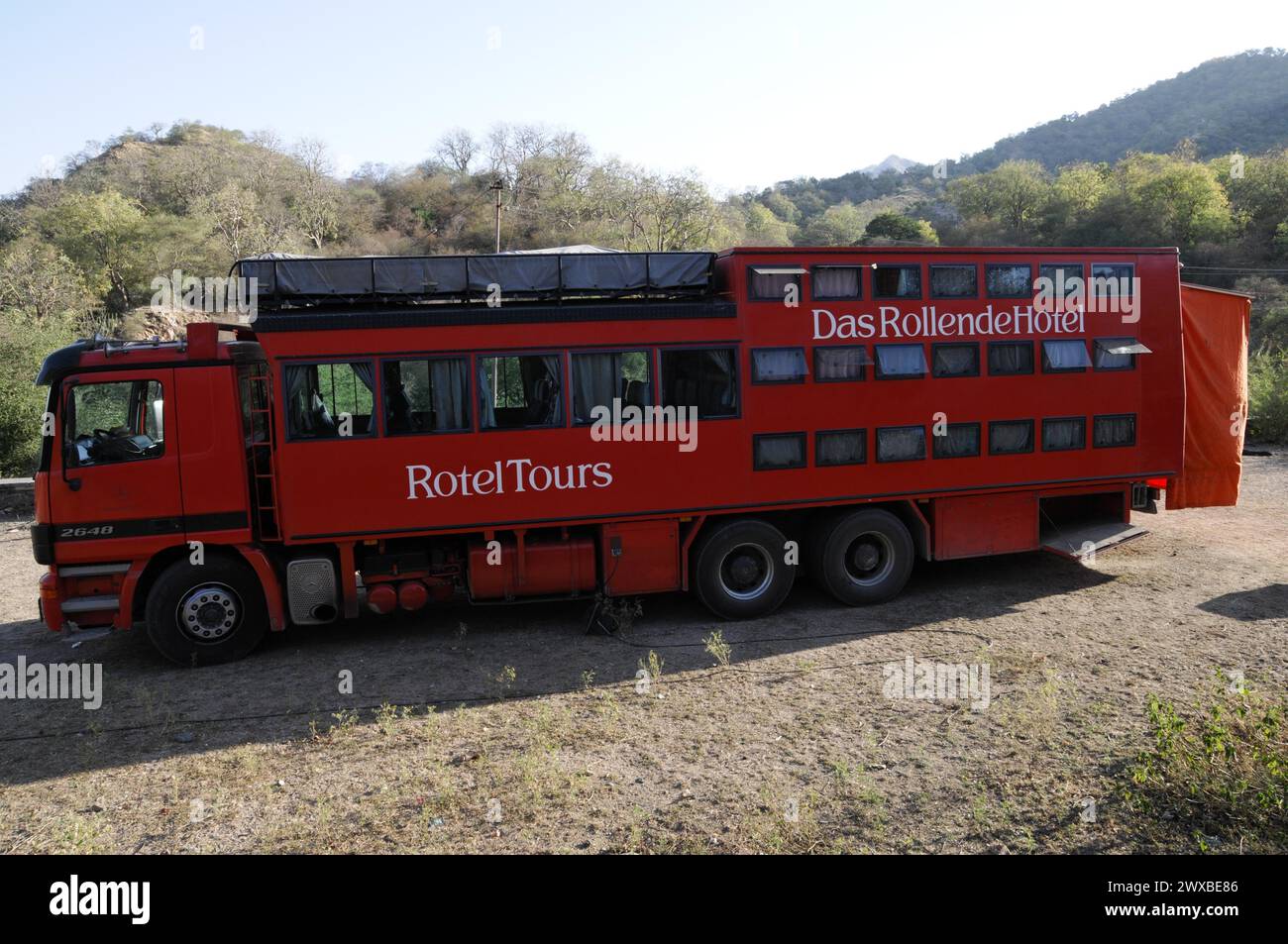 A red coach from Rotel Tours, known as the 'rolling hotel', Udaipur ...