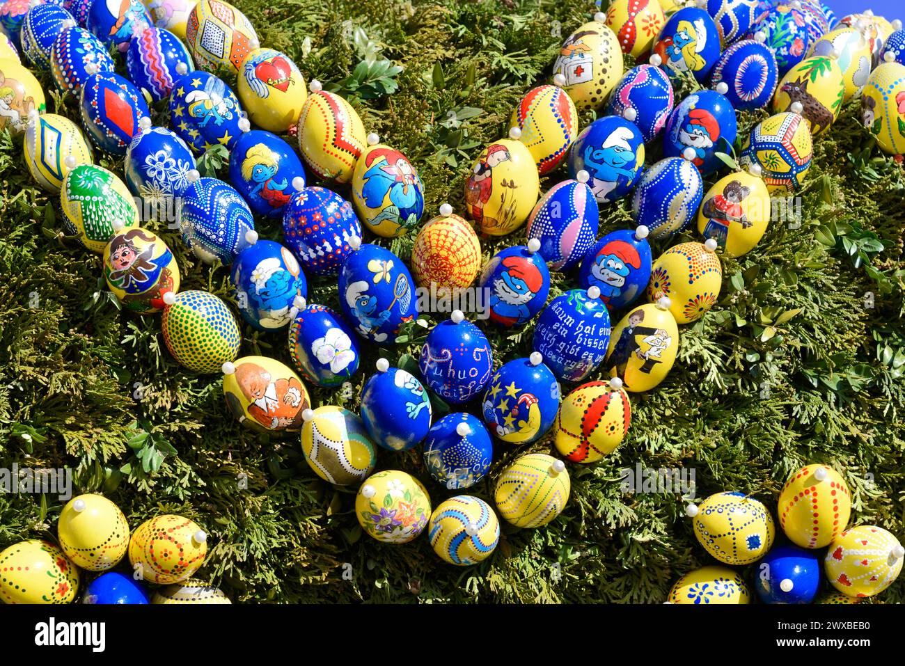 Collection of Easter eggs, artistically painted with various comic ...