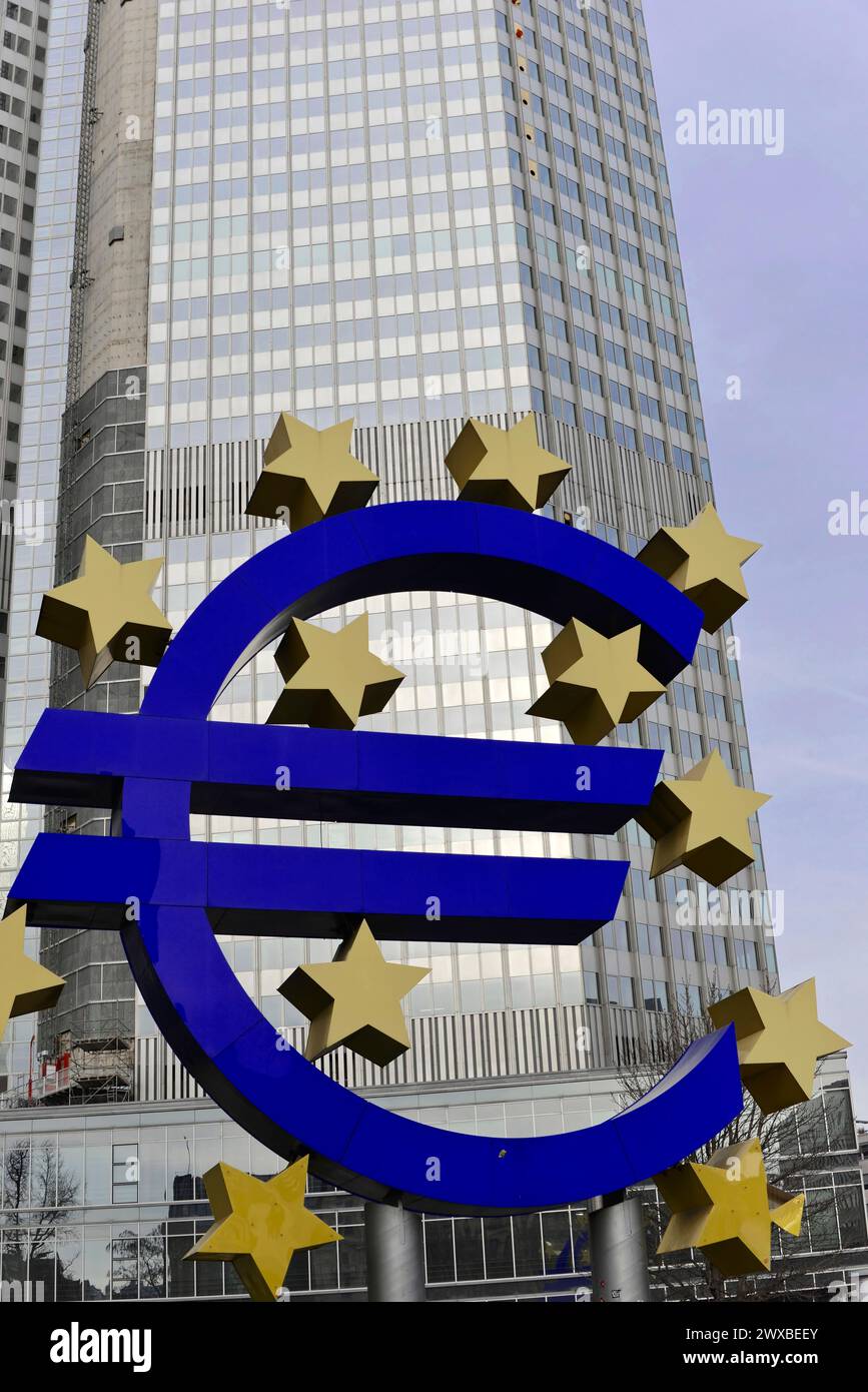Large sculpture of the euro symbol with yellow stars in front of a ...