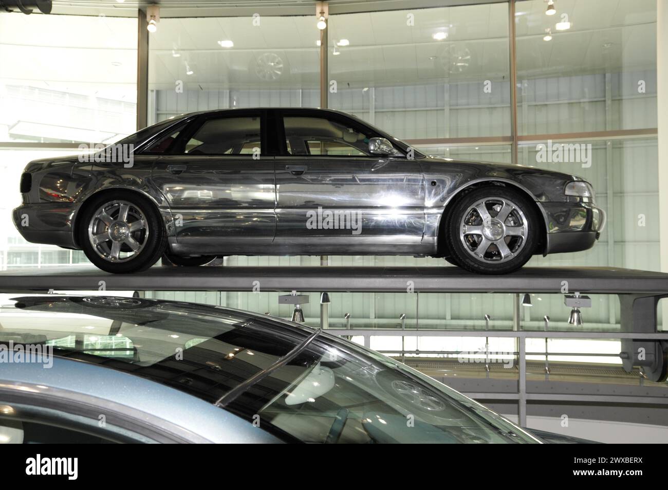 Museum mobile, Audi Museum, Black Audi limousine on a lifting platform ...