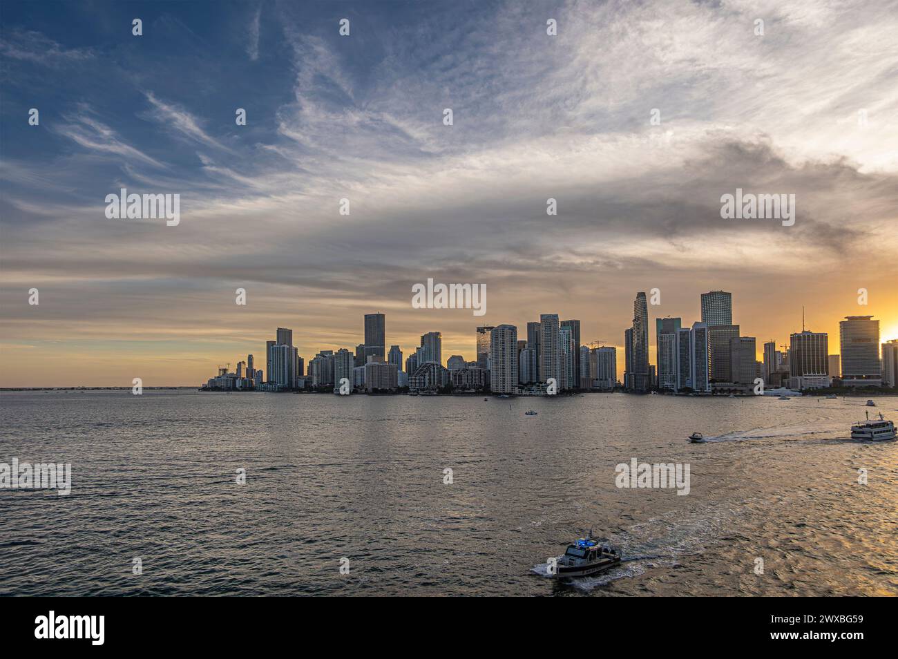 Miami, Florida, USA - July 29, 2023: Ground level sun behind Biscayne ...