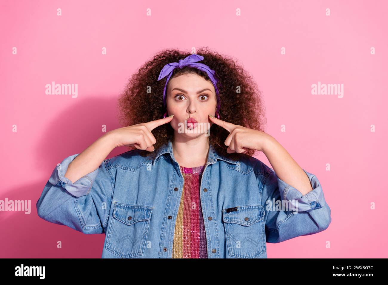 Photo of shiny funny lady dressed jeans outfit fingers pressing cheeks ...