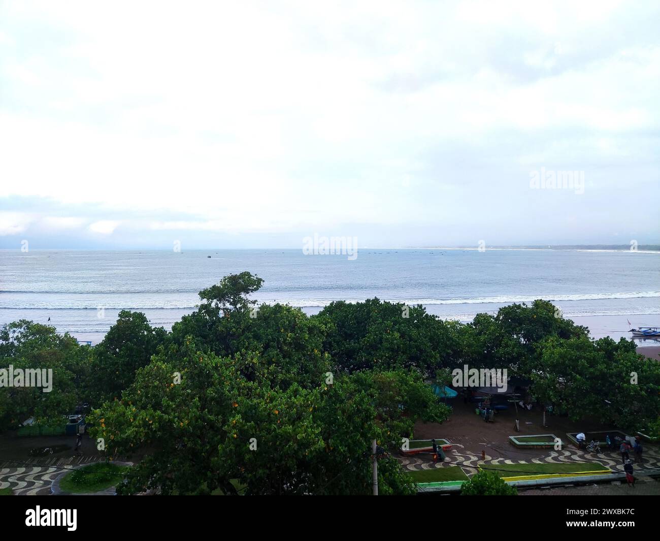 beautiful Pangandaran beach with cloudy sky background Stock Photo - Alamy