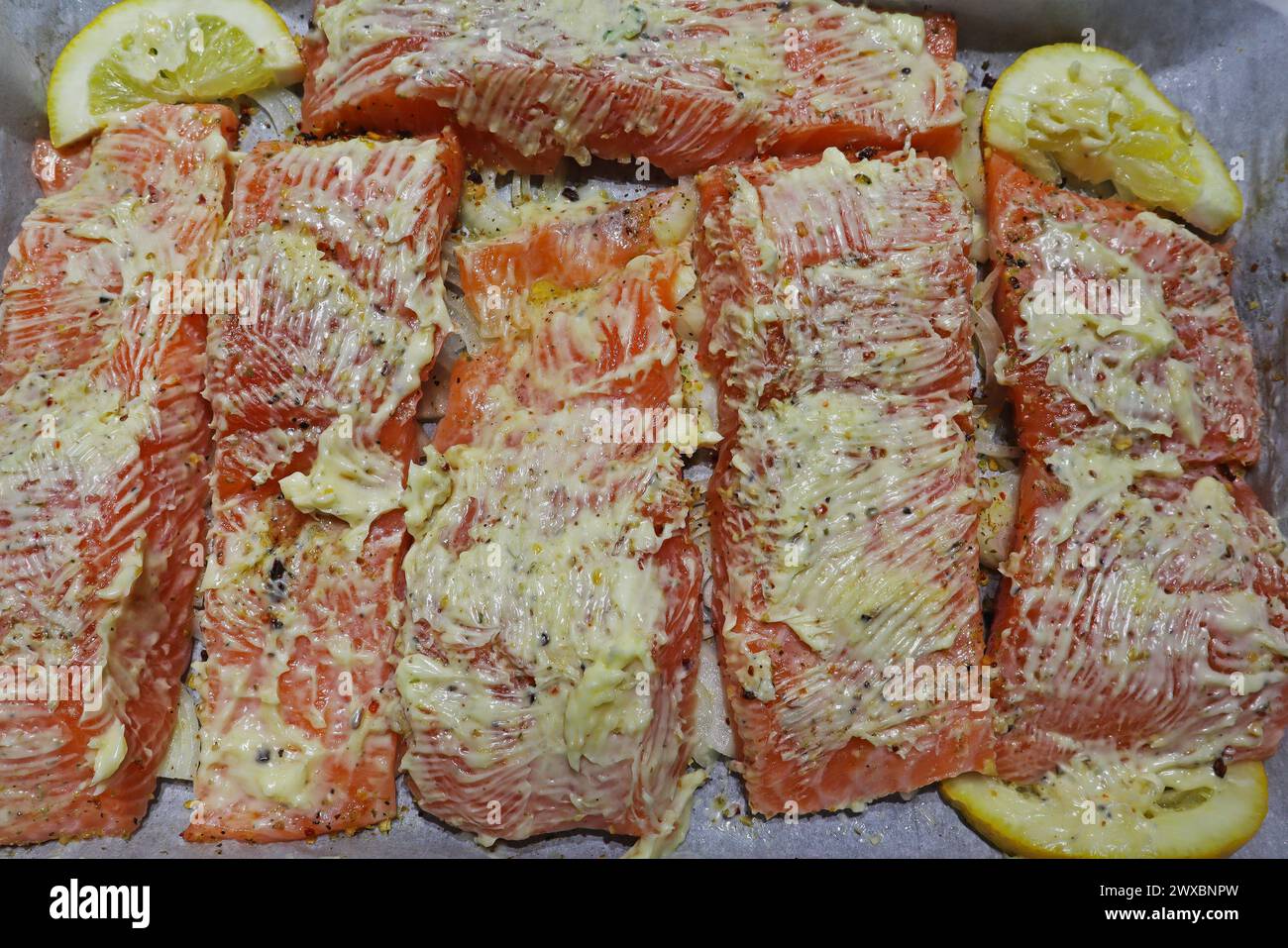 Red fish with lemon is ready for heat treatment Stock Photo - Alamy