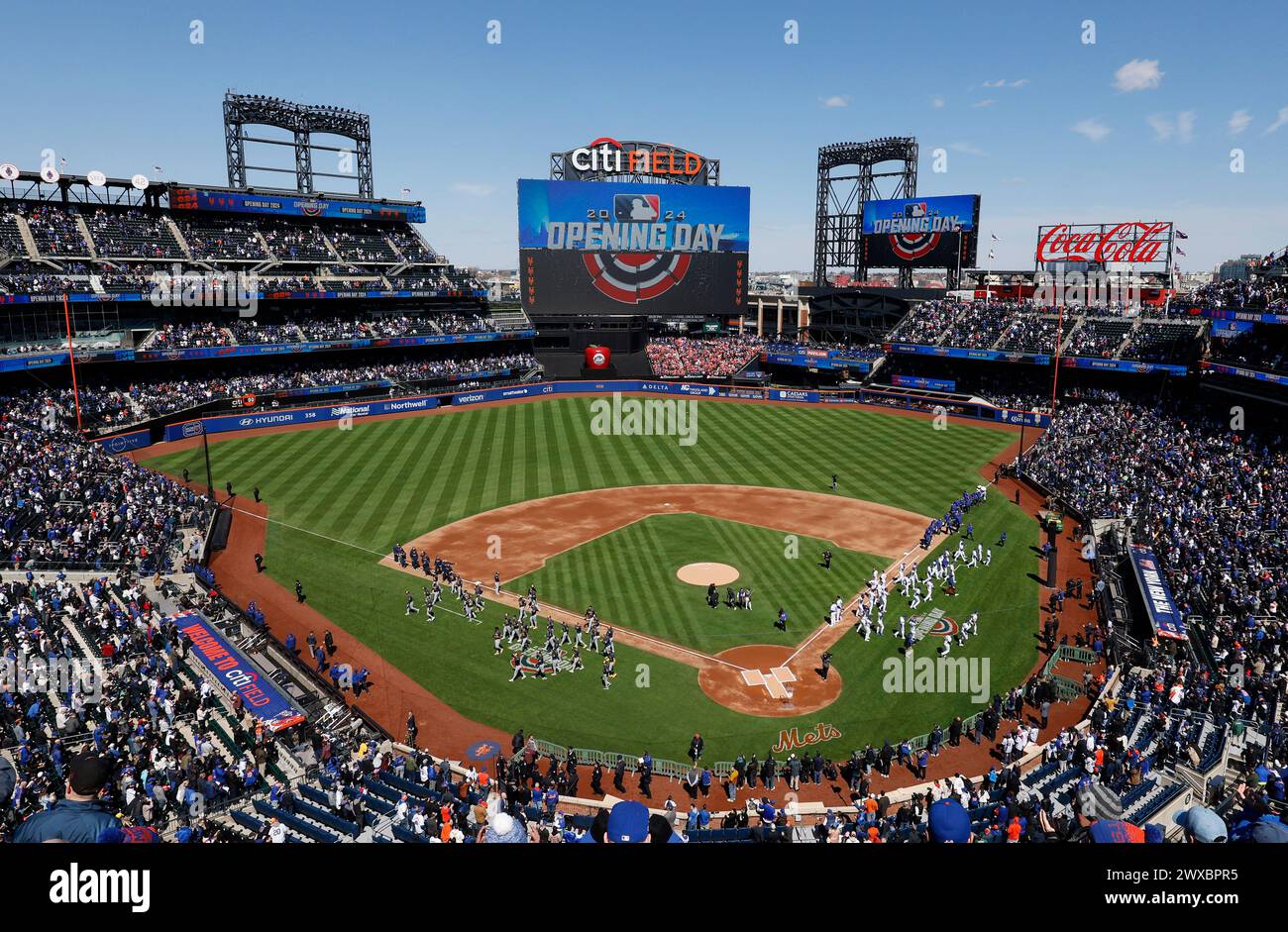 Queens, United States. 29th Mar, 2024. Players move to the dugouts ...