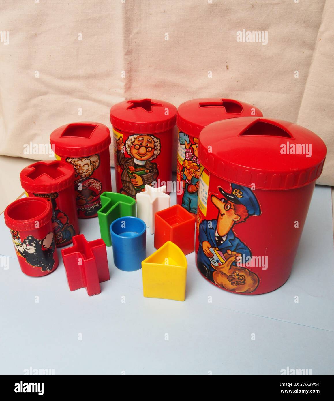 A retro, colourful, Postman Pat shape sorting toy, made with six ...