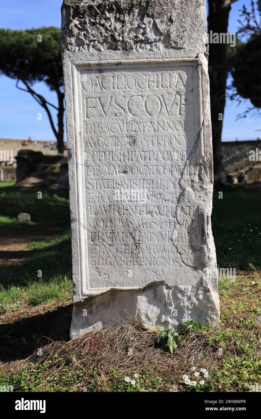 Ruin of a roman temple with a latin inscription in Ostia Antica, Italy ...
