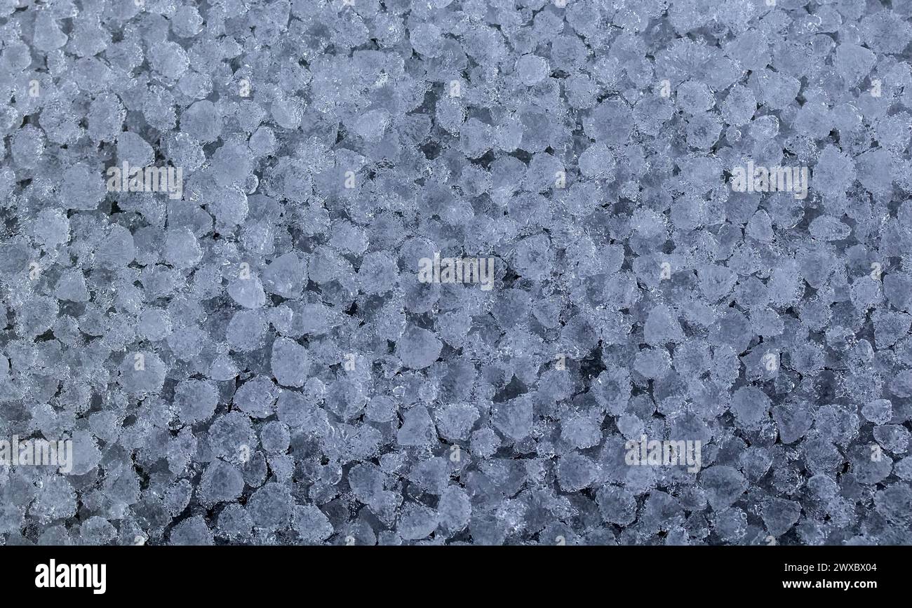 a lot of round crystals of ice precipitation fell in the form of hail ...