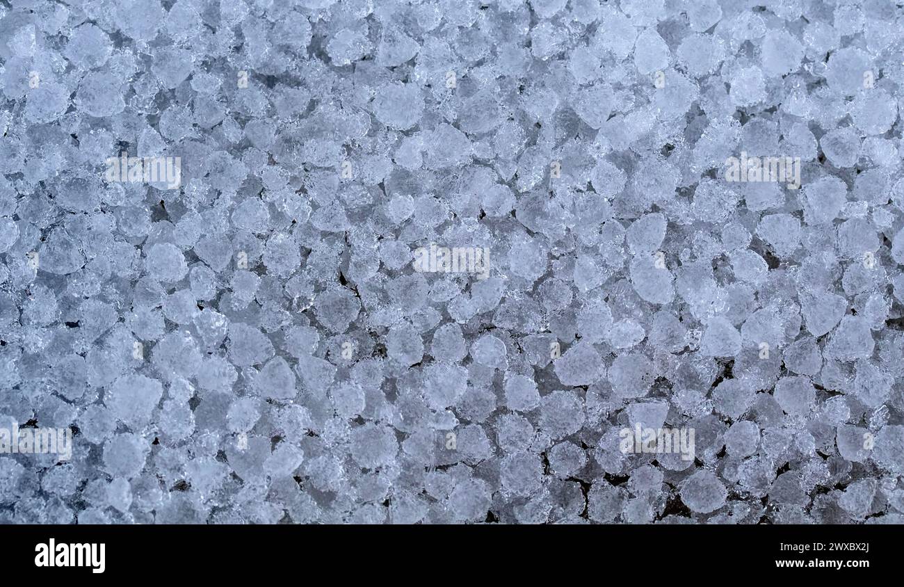 a lot of round crystals of ice precipitation fell in the form of hail ...