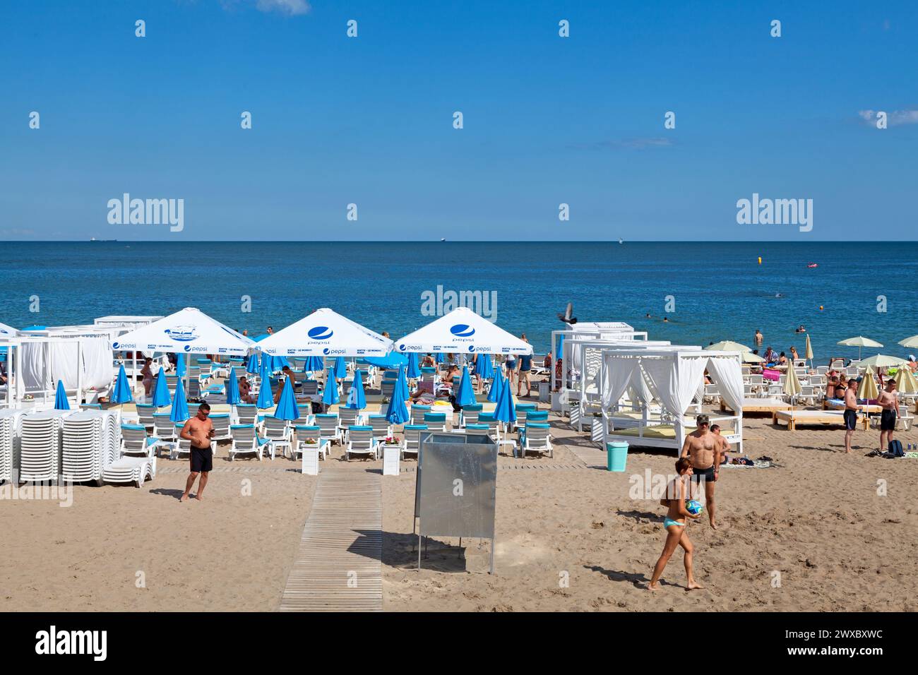 Odessa, Ukraine - July 01 2018: People enjoying the sun at Lanzheron ...