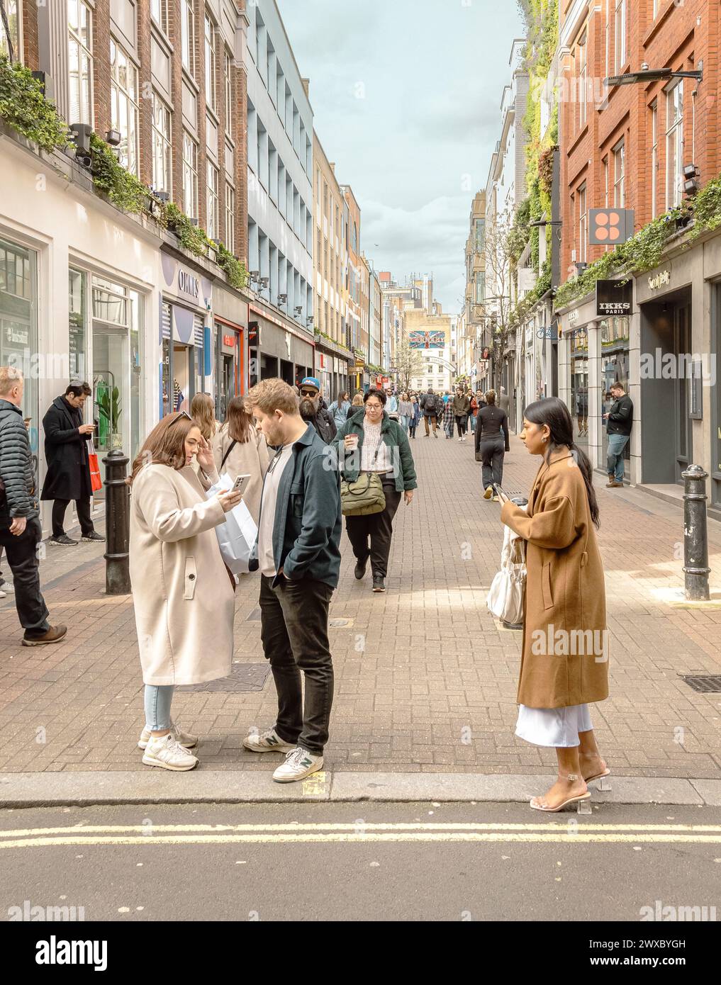 Shoppers and tourists in Carnaby Street, the iconic hub blending ...