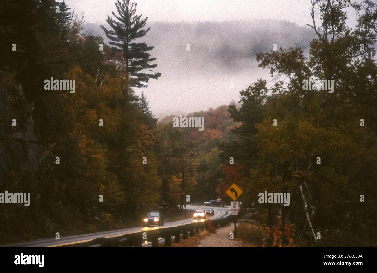 Cars in New England following the Kancamagus Highway in New Hampshire ...