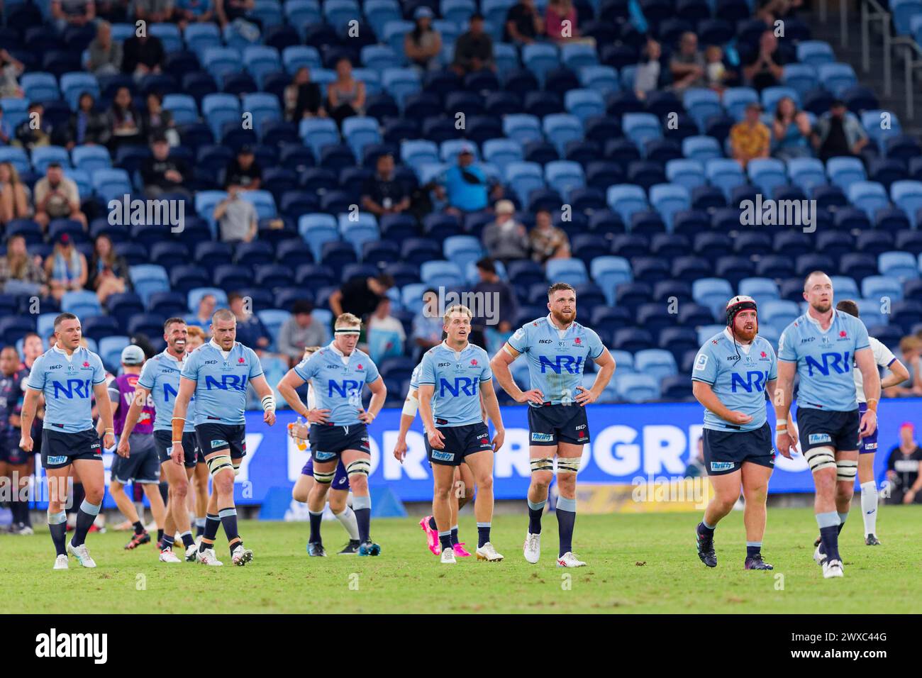 Sydney, Australia. 29th Mar, 2024. Waratahs players look to the ...