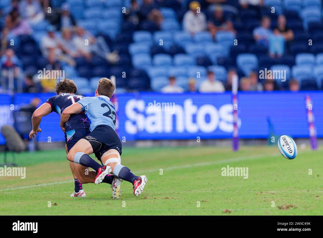 Sydney, Australia. 29th Mar, 2024. Darby Lancaster of the Rebels is ...