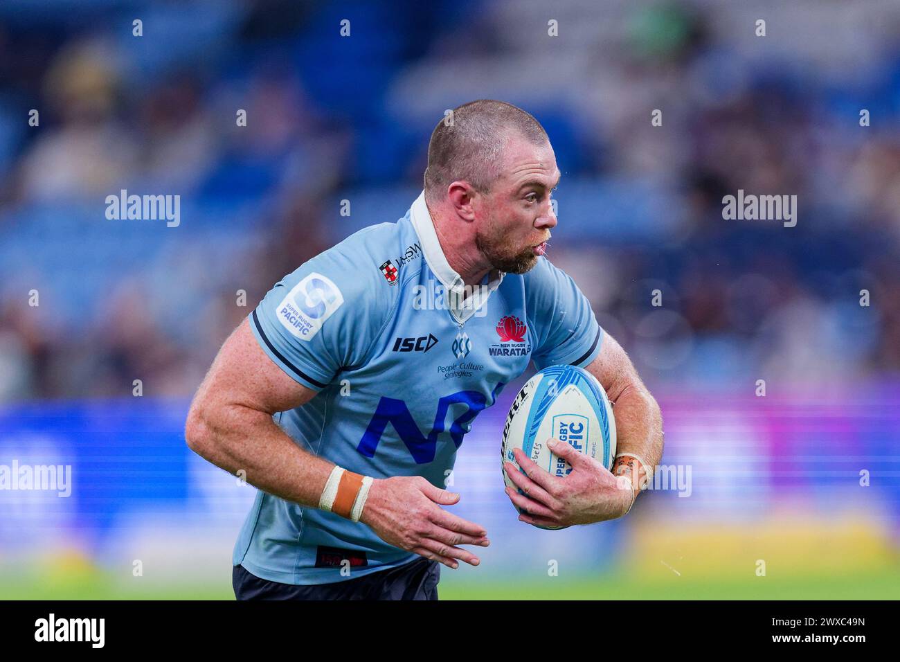 Sydney, Australia. 29th Mar, 2024. Jed Holloway of the Waratahs runs ...