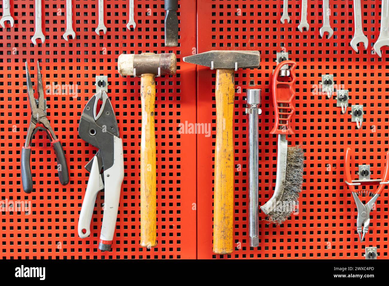 Wrenches and tools on a red metal tool cabinet Stock Photo - Alamy