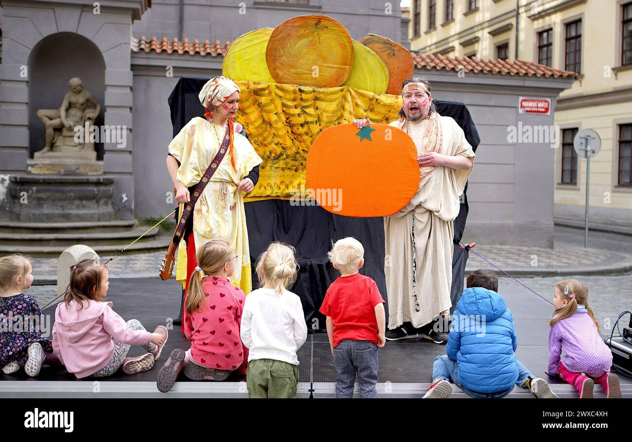 Prague, Czech Republic. 29th Mar, 2024. Children watch a theater ...