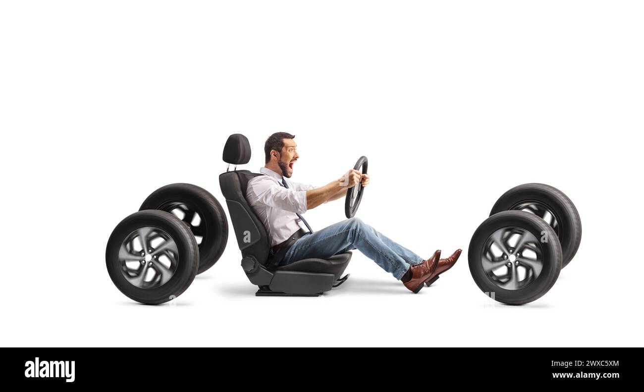 Scared driver holding a steering wheel and shouting isolated on white ...