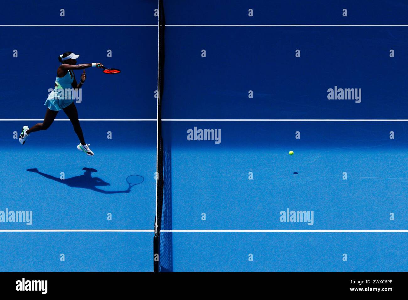 Miami, Florida, USA. 29th Mar, 2024. Asia Muhammad (USA)hits a forehand ...
