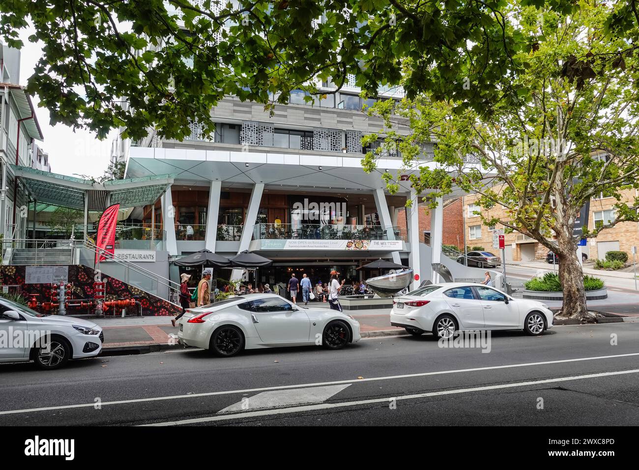 Cars parked in front of a small retail complex on Victoria Ave in ...