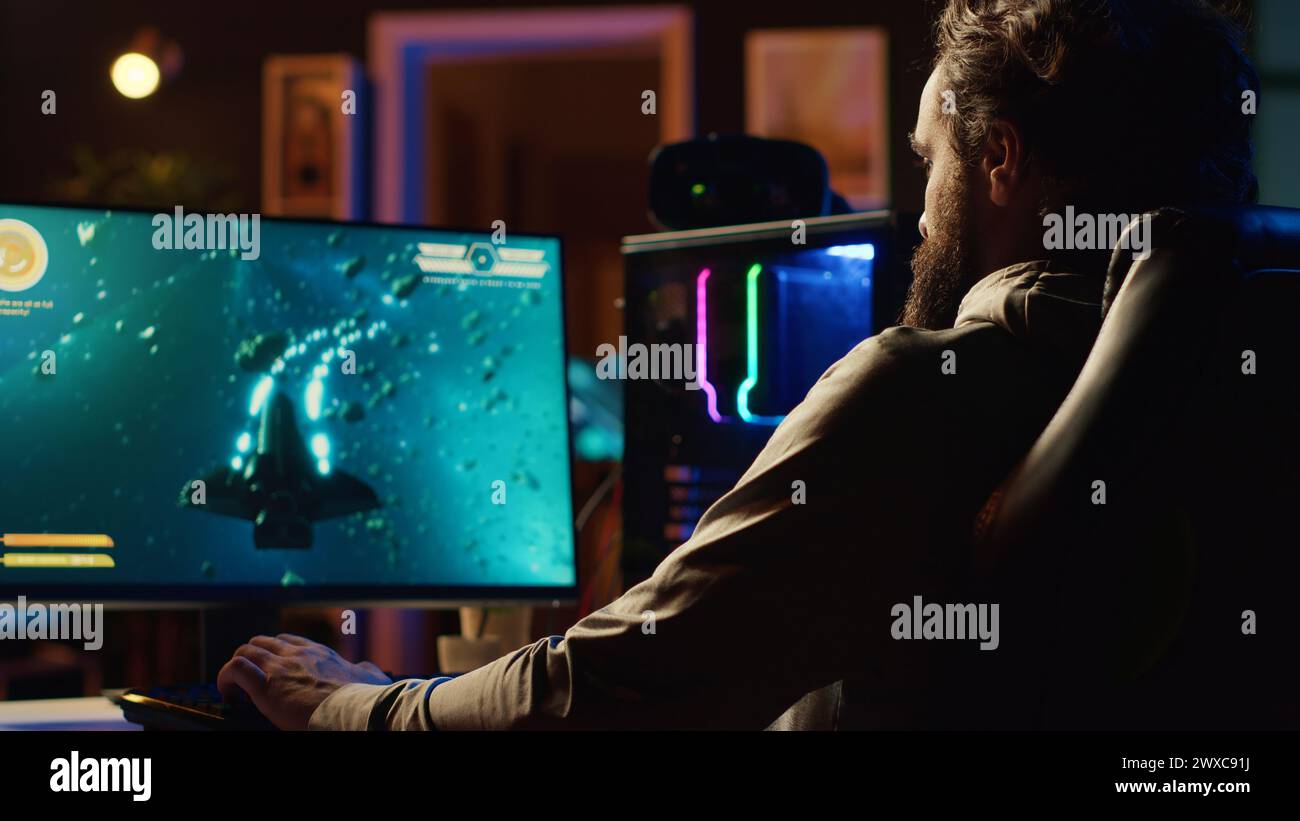 Man shooting asteroids in spaceship flying singleplayer game with ...