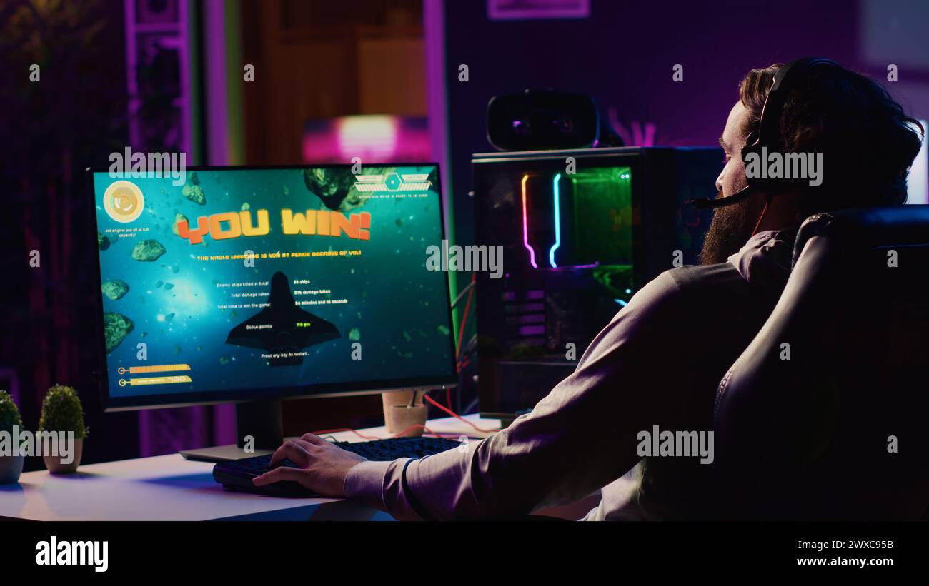 Victorious gamer celebrating in hi-res stock photography and images - Alamy