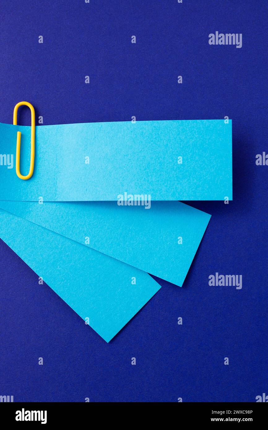 Notes with different directions joined with a clip Stock Photo - Alamy