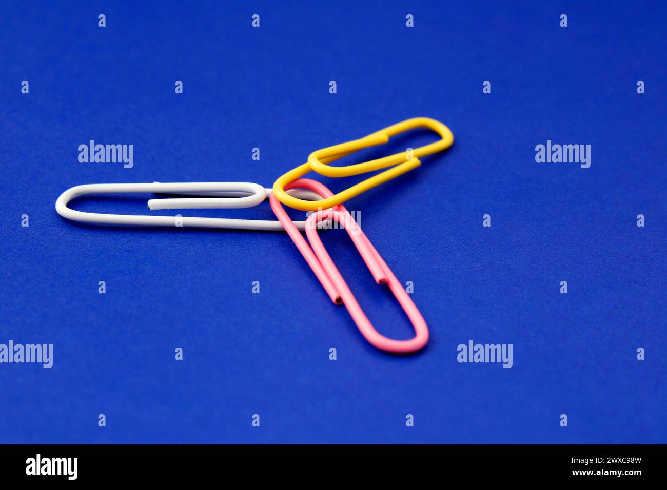 Notes with different directions joined with a clip Stock Photo - Alamy