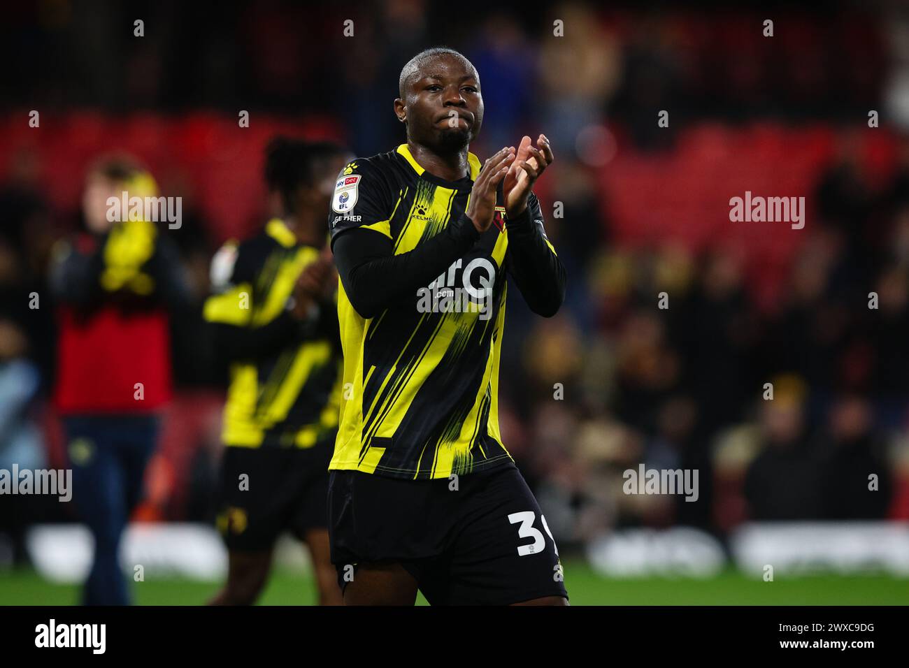 WATFORD, UK - 29th Mar 2024: Edo Kayembe of Watford acknowledges the ...