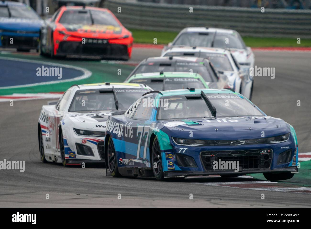 Carson Hocevar races for position for the EchoPark Automotive Grand ...