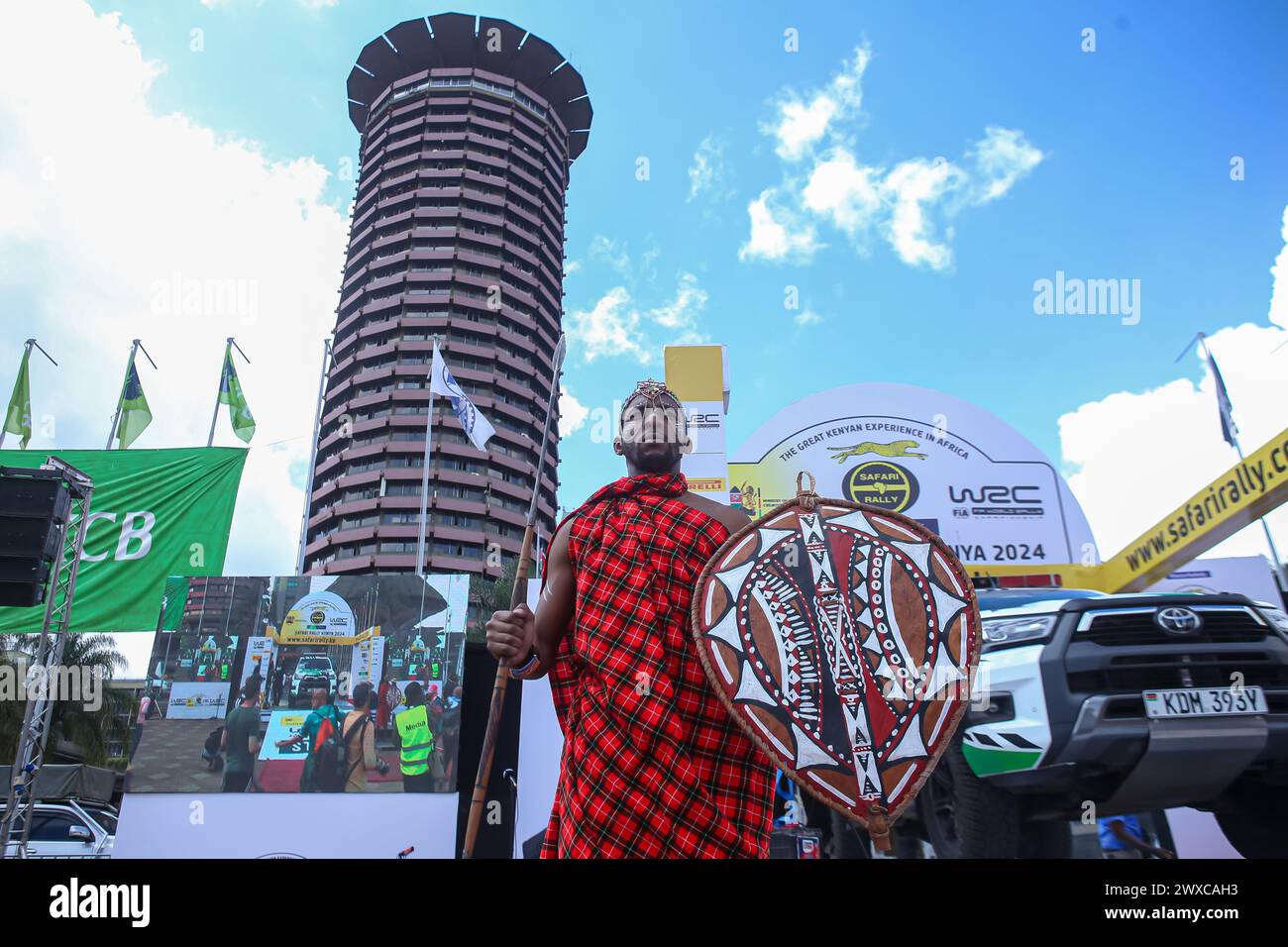 A Kenyan traditional dancer from the bomas of Kenya stands near the ...