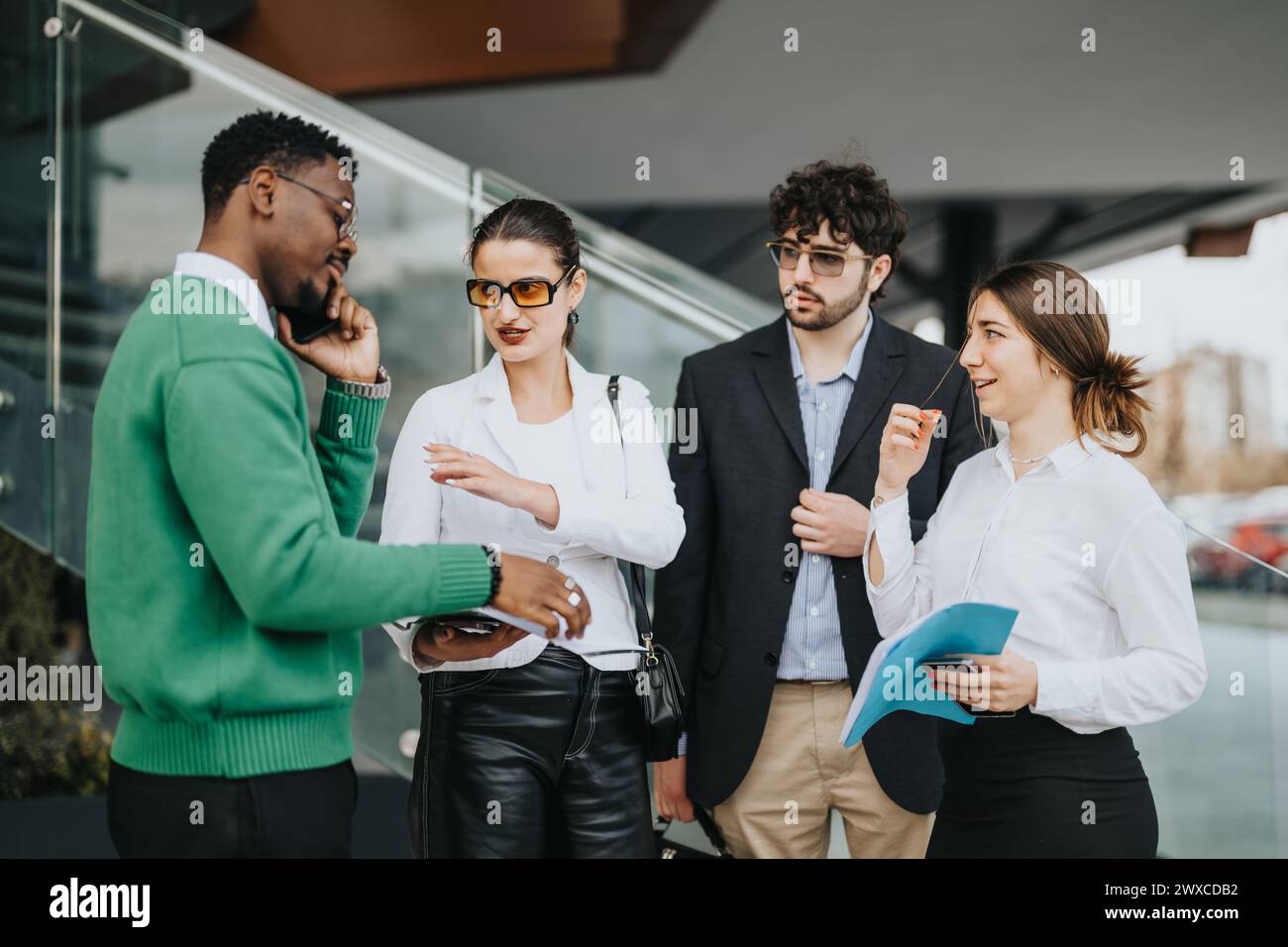 Multicultural business team strategizing outdoors for company growth ...