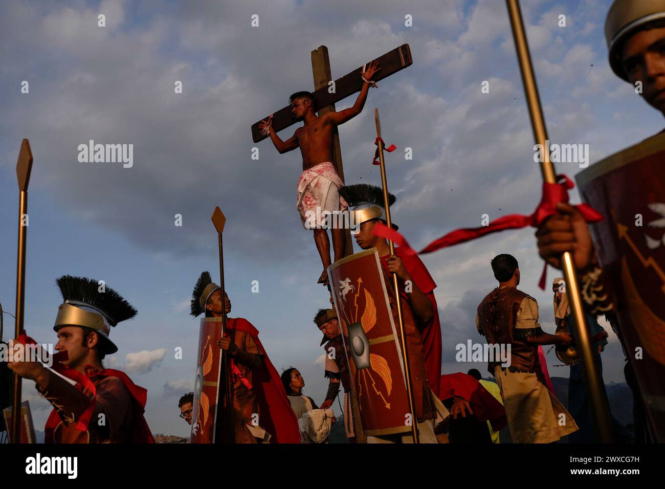 A penitent depicting the role of one of two thieves sentenced to be crucified alongside Jesus ...