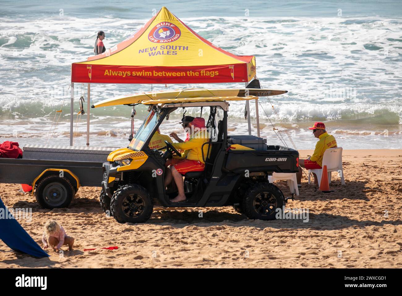 Surf Rescue volunteers on Palm Beach with shade tent and Can Am beach ...