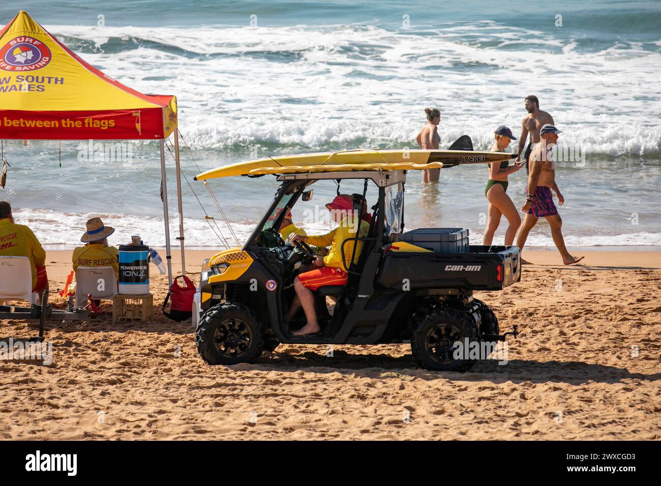 Surf Rescue volunteers on Palm Beach with shade tent and Can Am beach ...